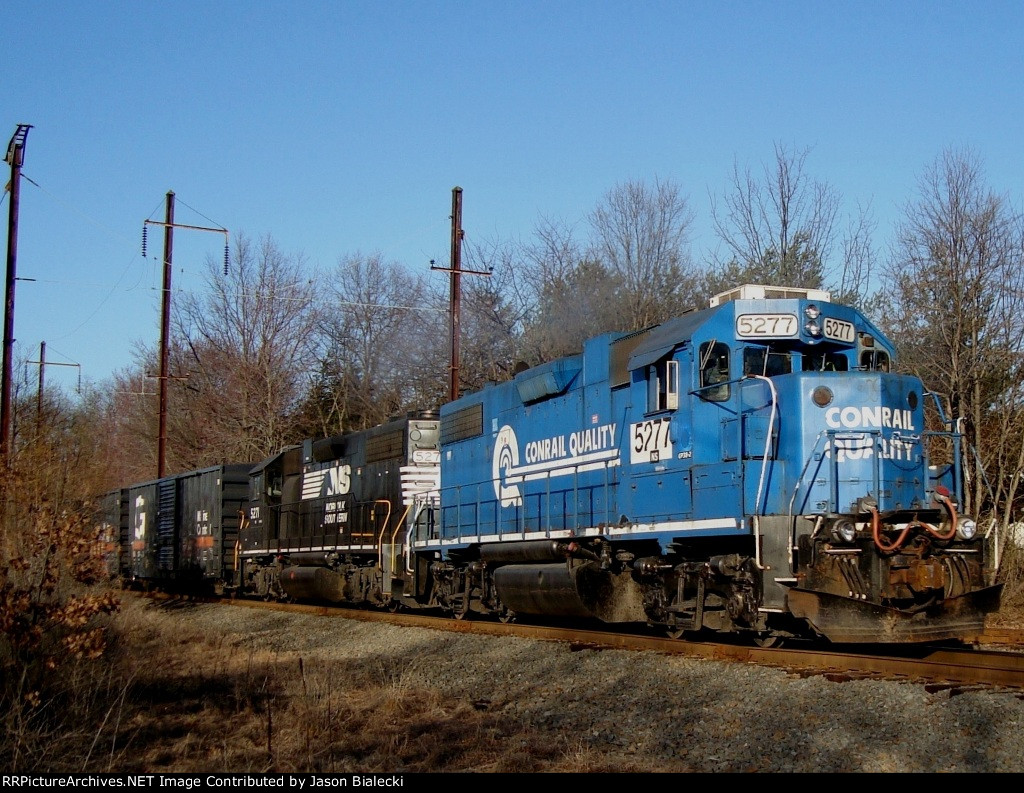 Conrail Blue NS 5277 and 5271 power up a shallow grade as they enter onto the Dayton Branch.